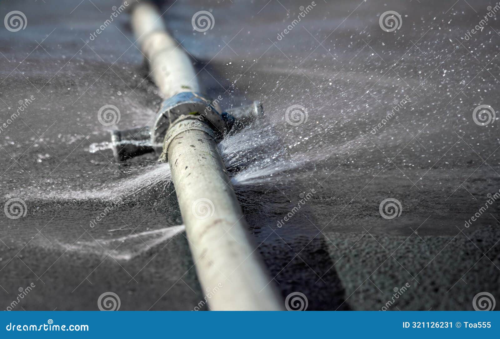 Water Leaking from Hole in a Hose Stock Image - Image of loss, conserve ...
