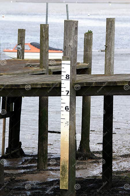 A Water Level Marker for Tidal Level Stock Photo - Image of tide ...