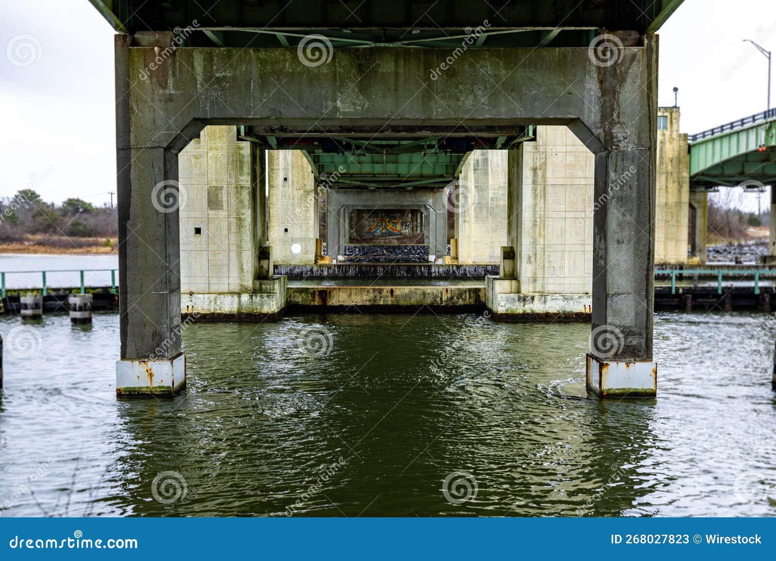 Water-level Shot of the Underside of a Bridge. Stock Image - Image of ...