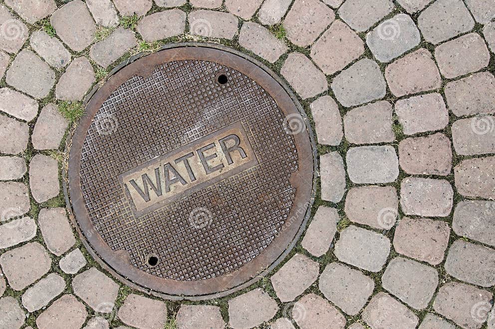 Water Manhole Cover with Brick Stock Image - Image of manhole, cover ...