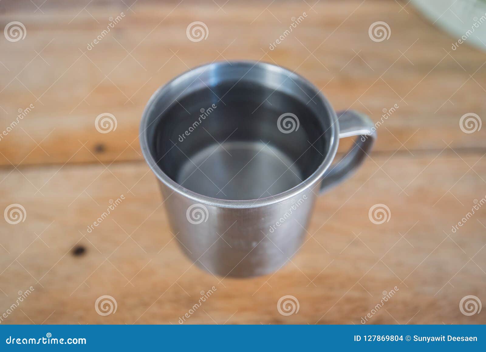 Water in metal cup stock photo. Image of beverage, silver - 127869804