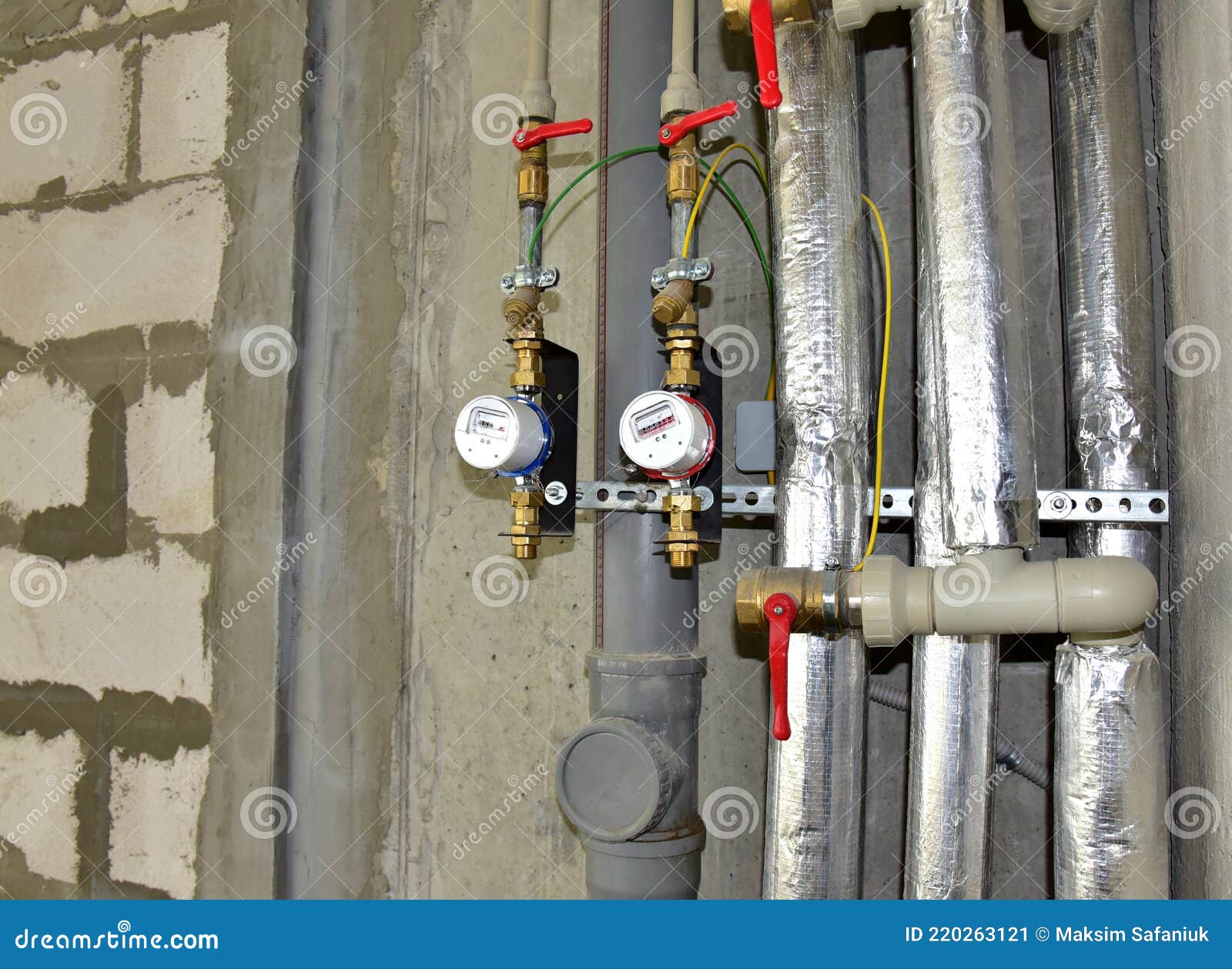 Water Meter of Cold and Hot Water on the Brick Wall Background in New ...