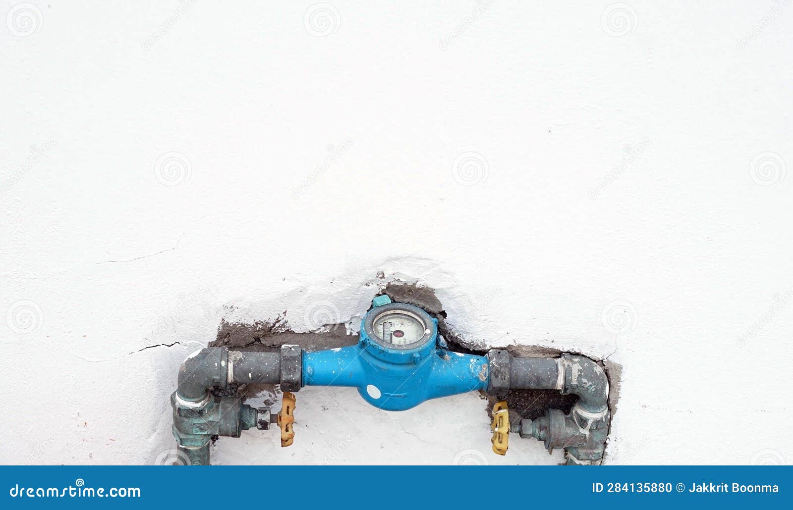 A Water Meter Installed on the White Cement Wall for Background and ...