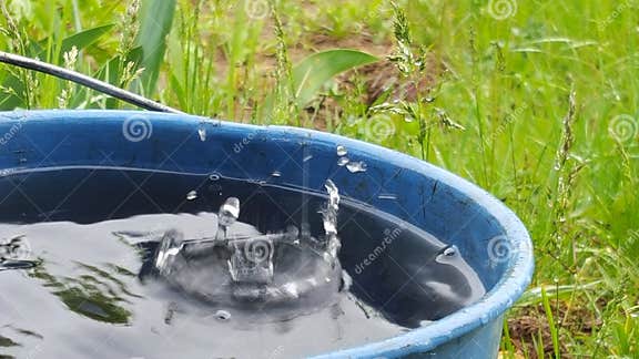 Water motion stock photo. Image of bucket, motion, drop - 91594564