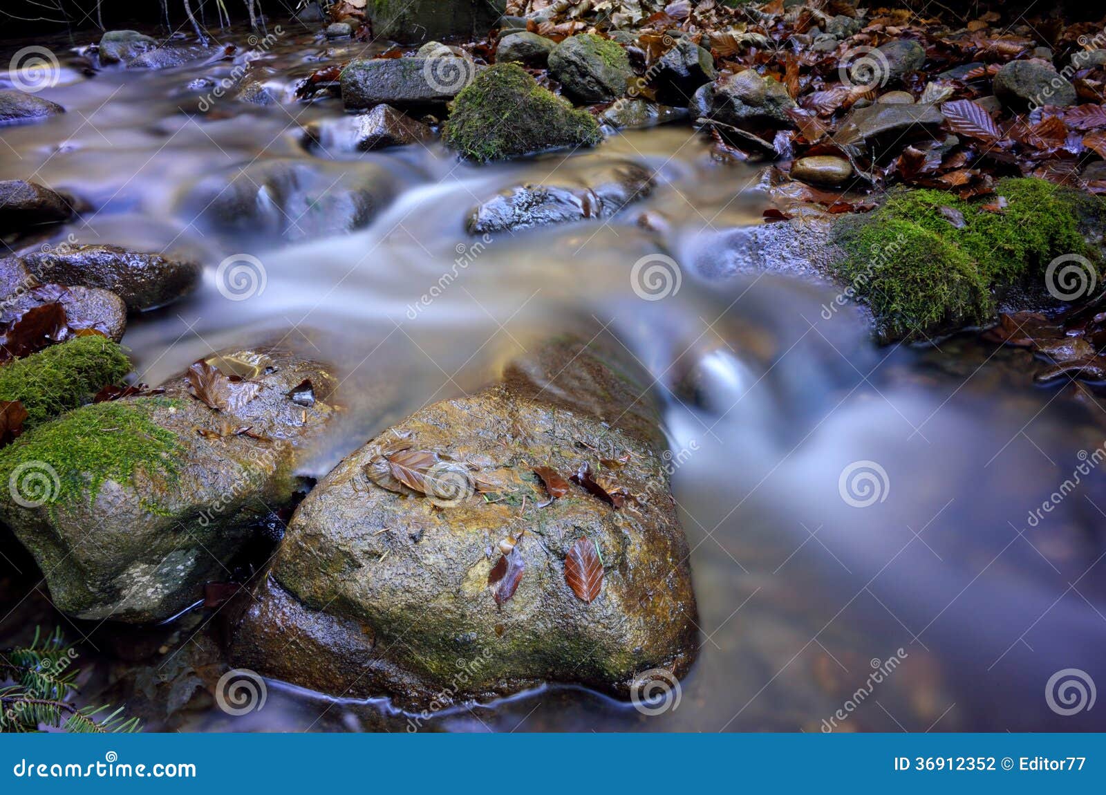 Water in motion stock photo. Image of rocks, colors, motion - 36912352
