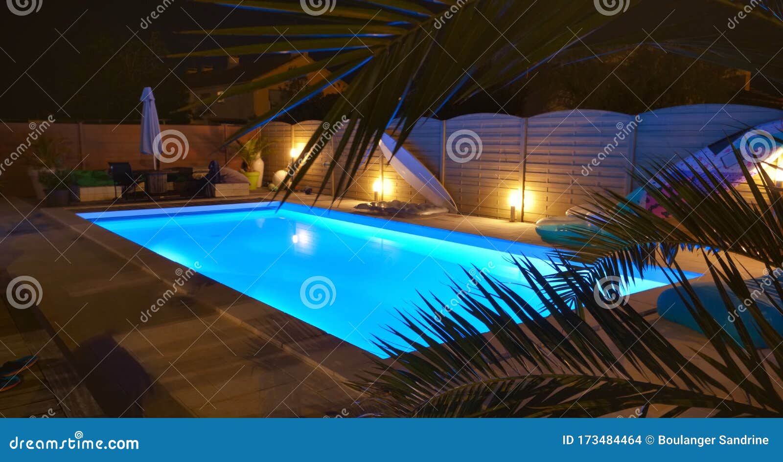 Water Od Swimming Pool Illuminated in Blue by Night Stock Photo - Image ...