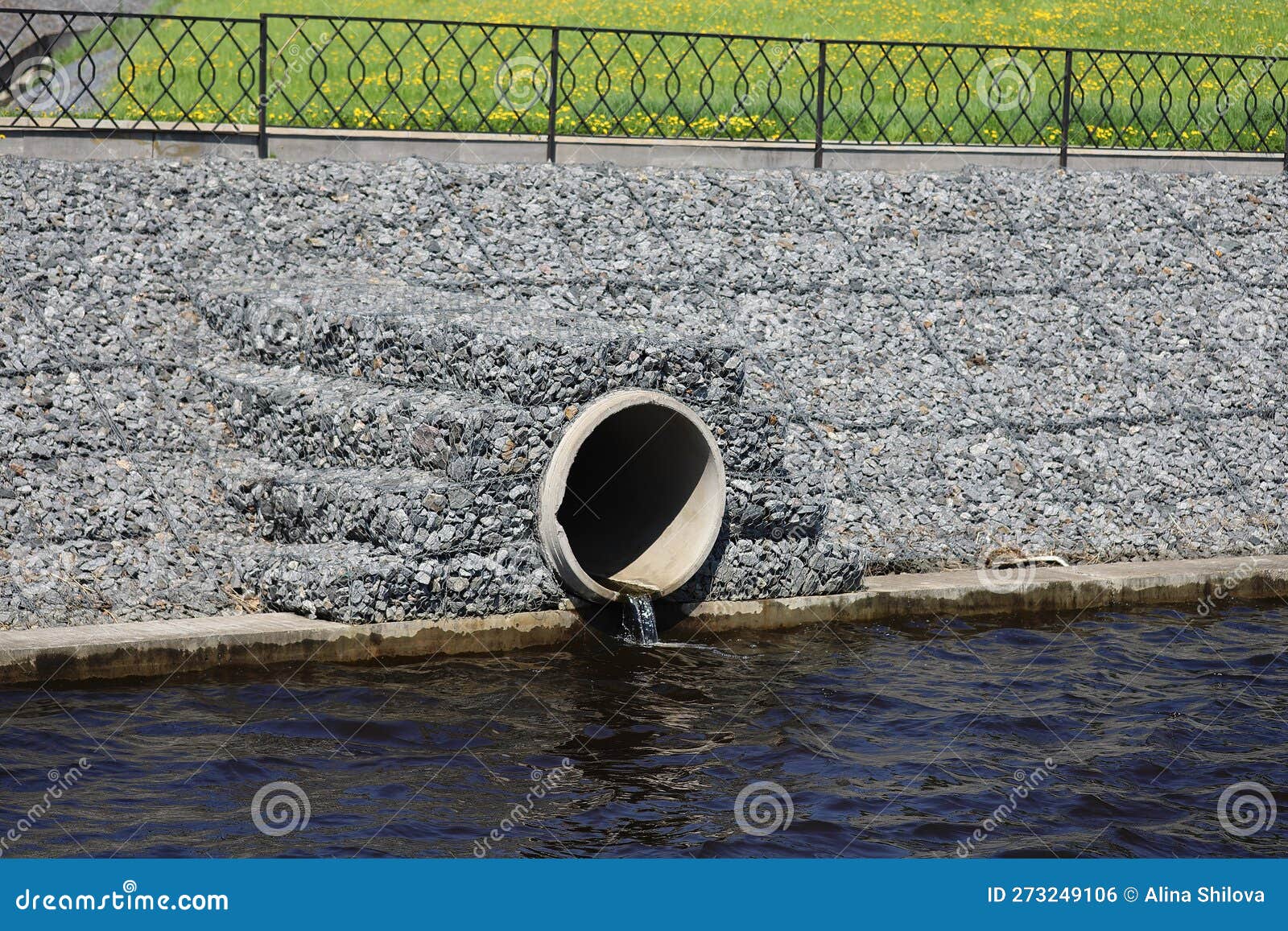 Water Outflows in the River through Flood Drainage System. Stock Photo ...