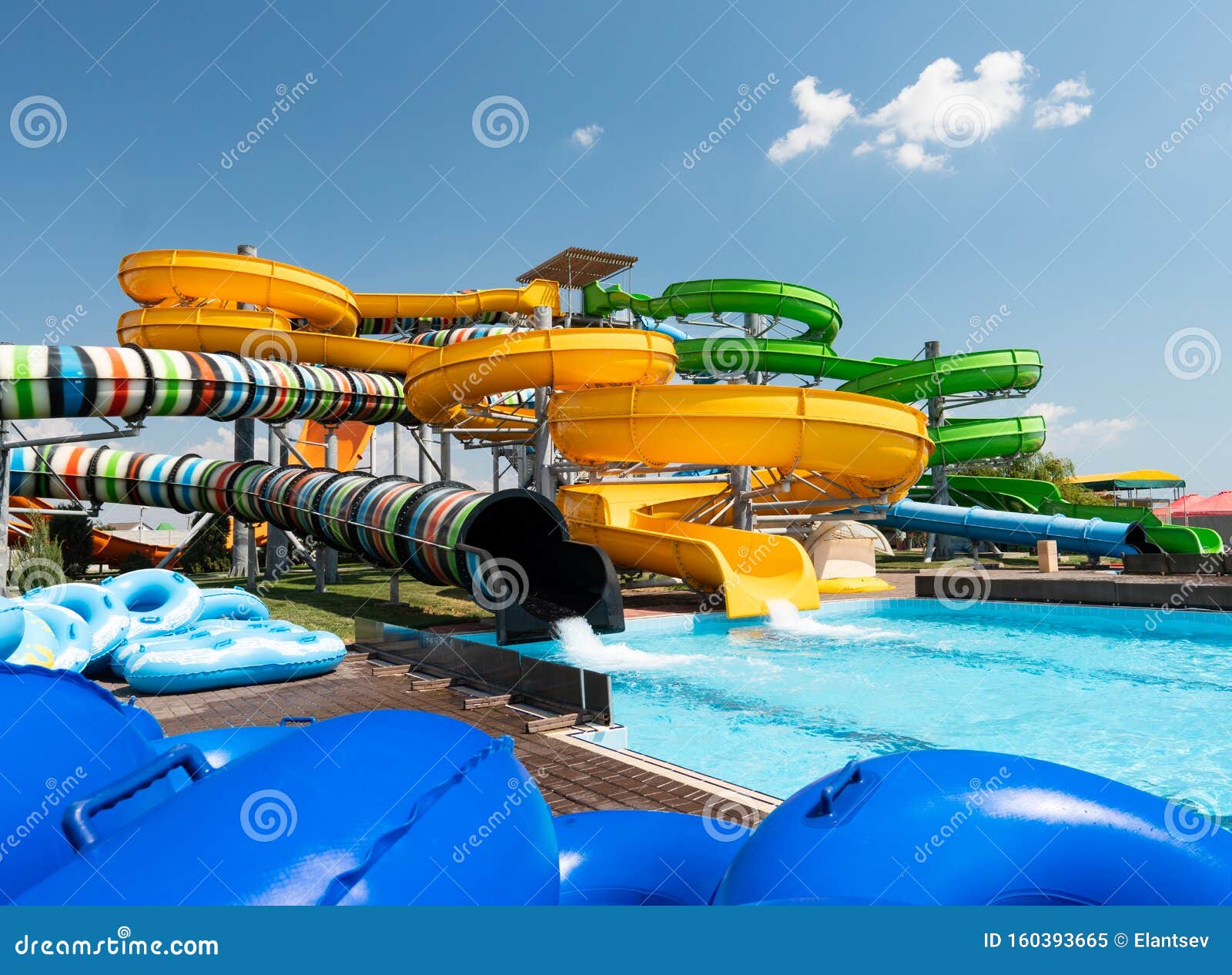 Water Park with Colorful Slides and Pools Stock Image - Image of ...