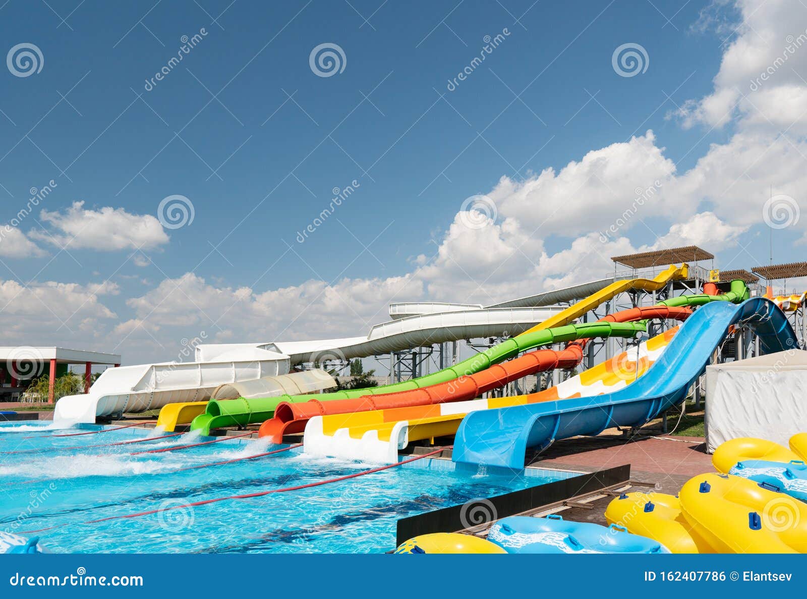 Water Park with Colorful Slides and Pools Stock Photo - Image of ...
