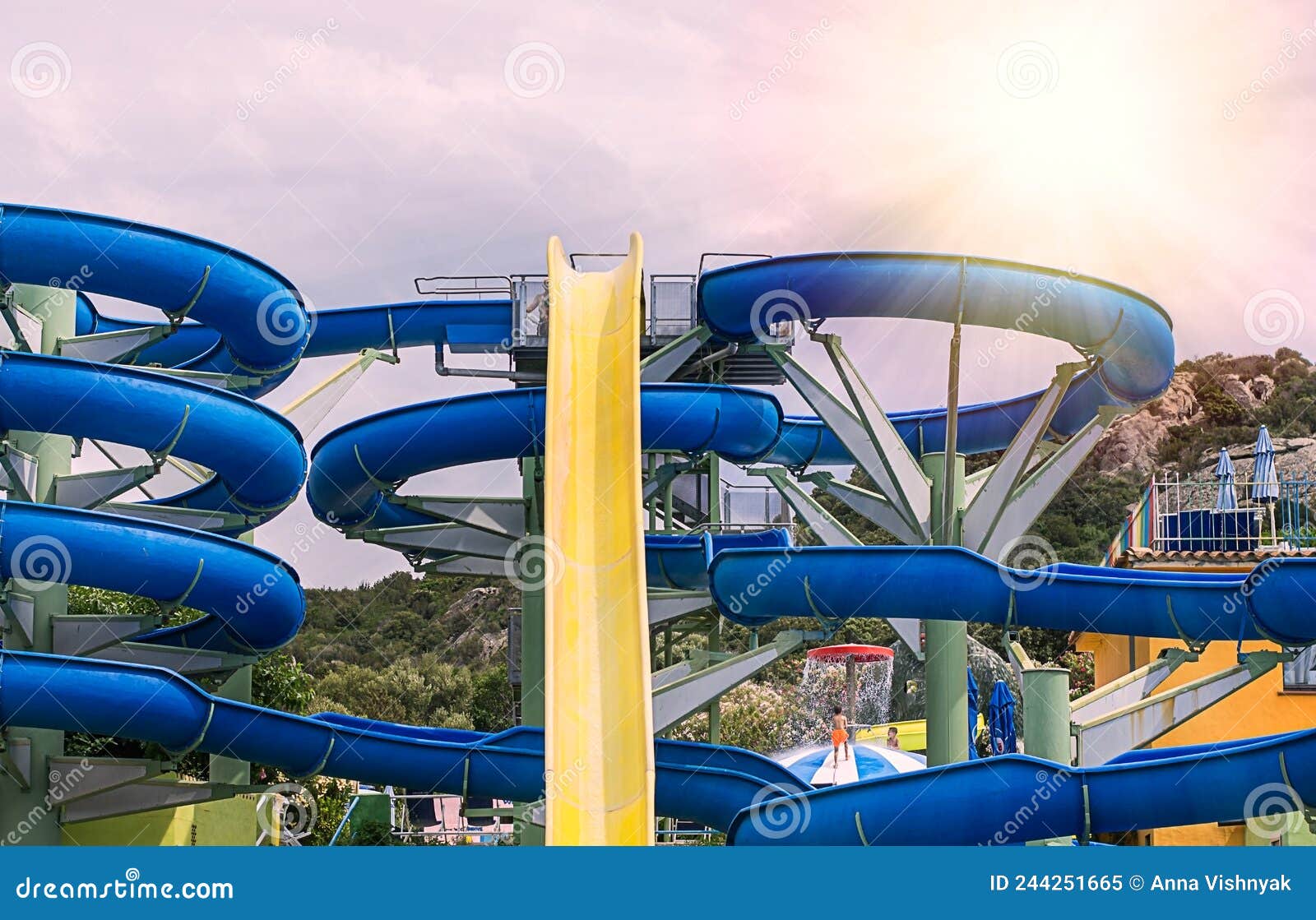 Water Park with Colorful Slides and Pools. Stock Image - Image of ...
