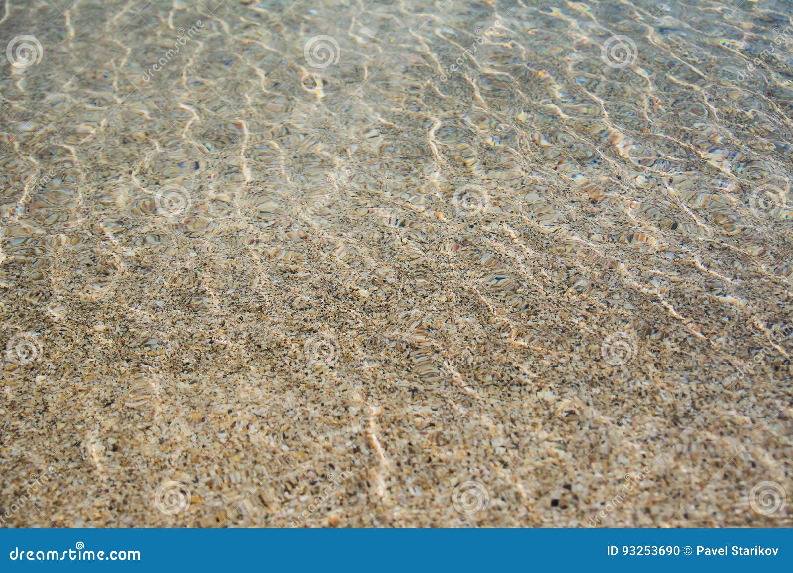 Water on a pebble beach stock photo. Image of smooth - 93253690