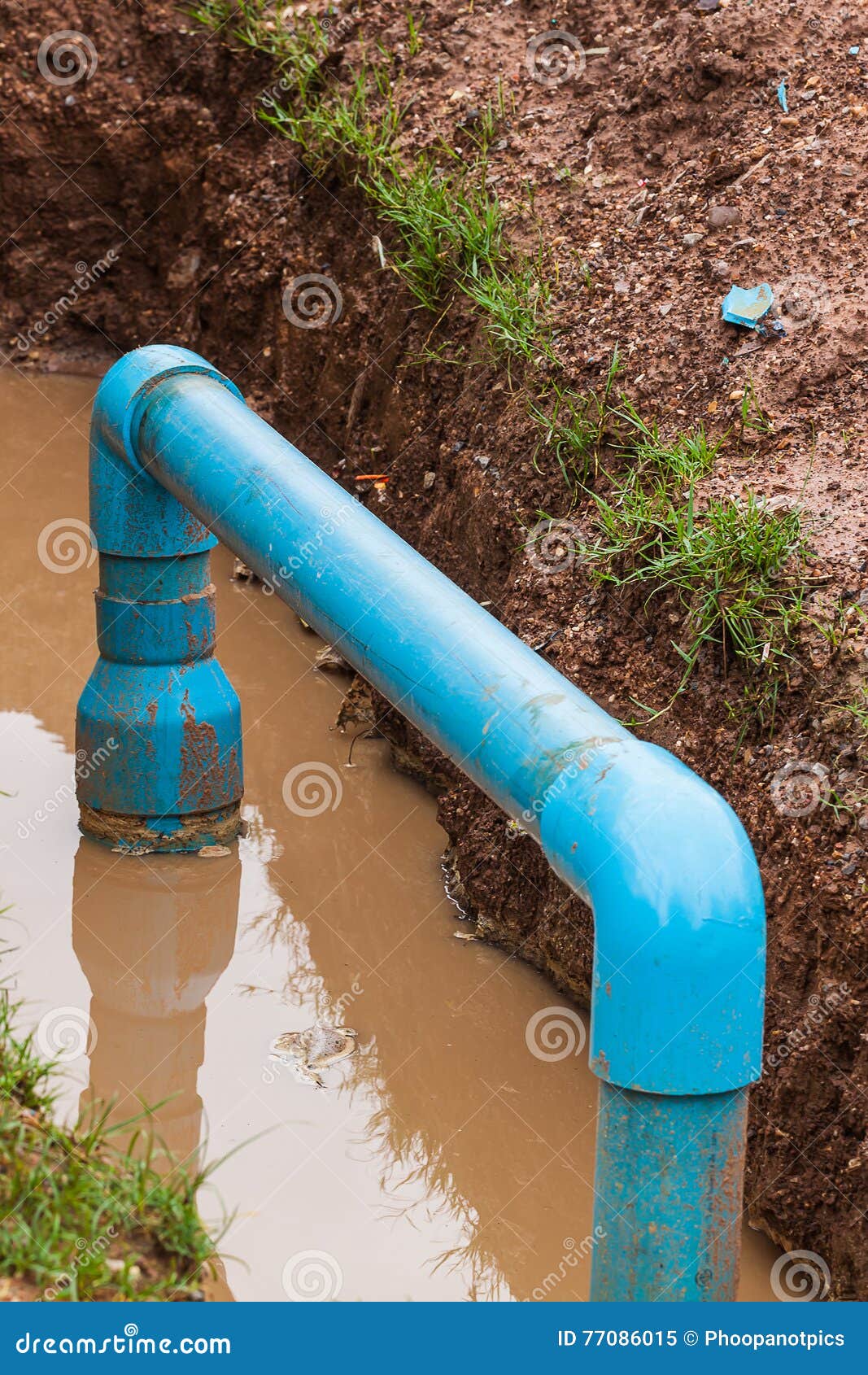 Water pipe in pit stock image. Image of components, connector - 77086015