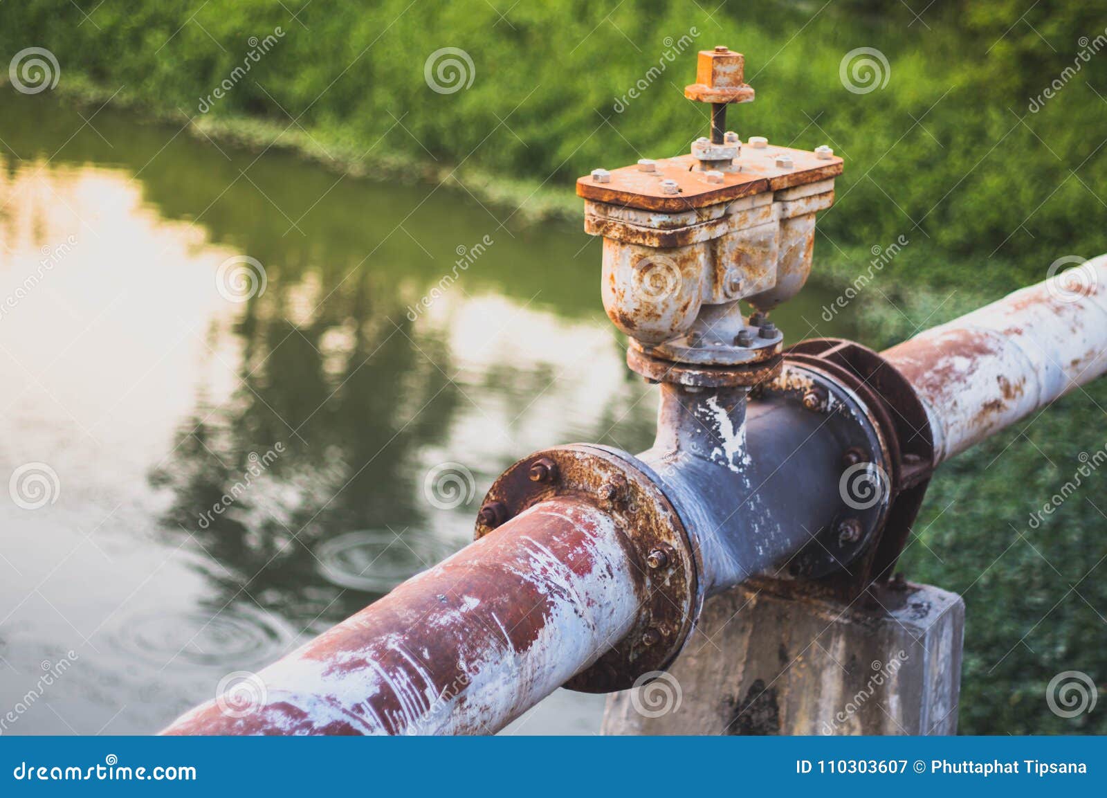 Water Pipe Pumping, Large Old Water Pipeline Across the Canal. Stock ...