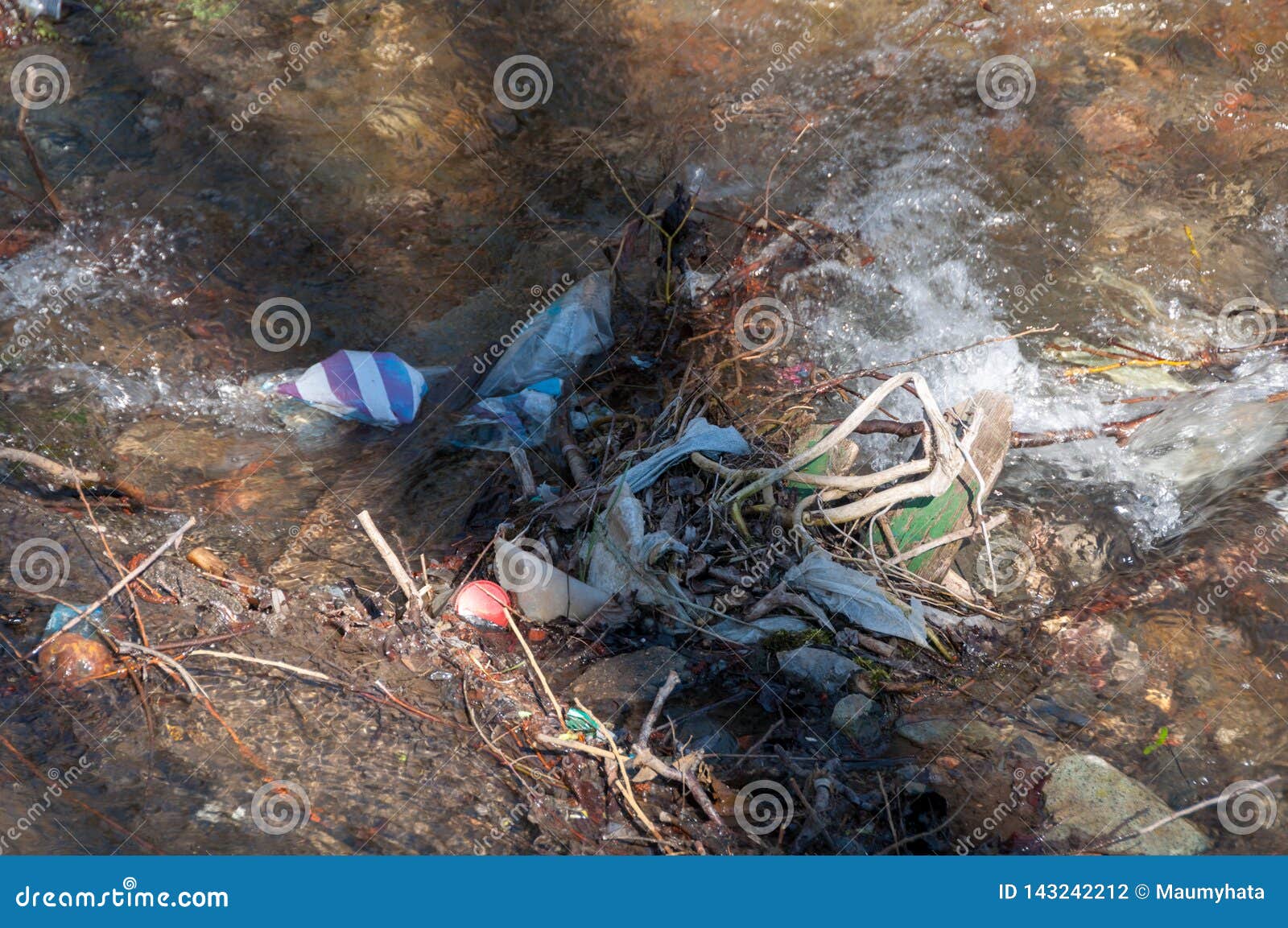 Plastic and Foam Garbage Floating on the Surface of the River Stock ...