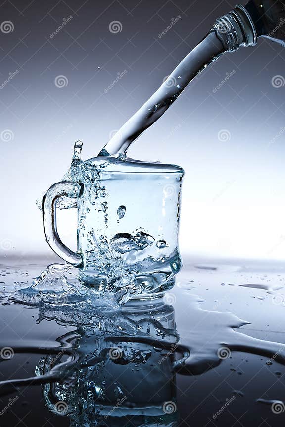 Water pouring into cup stock image. Image of flowing - 42219849