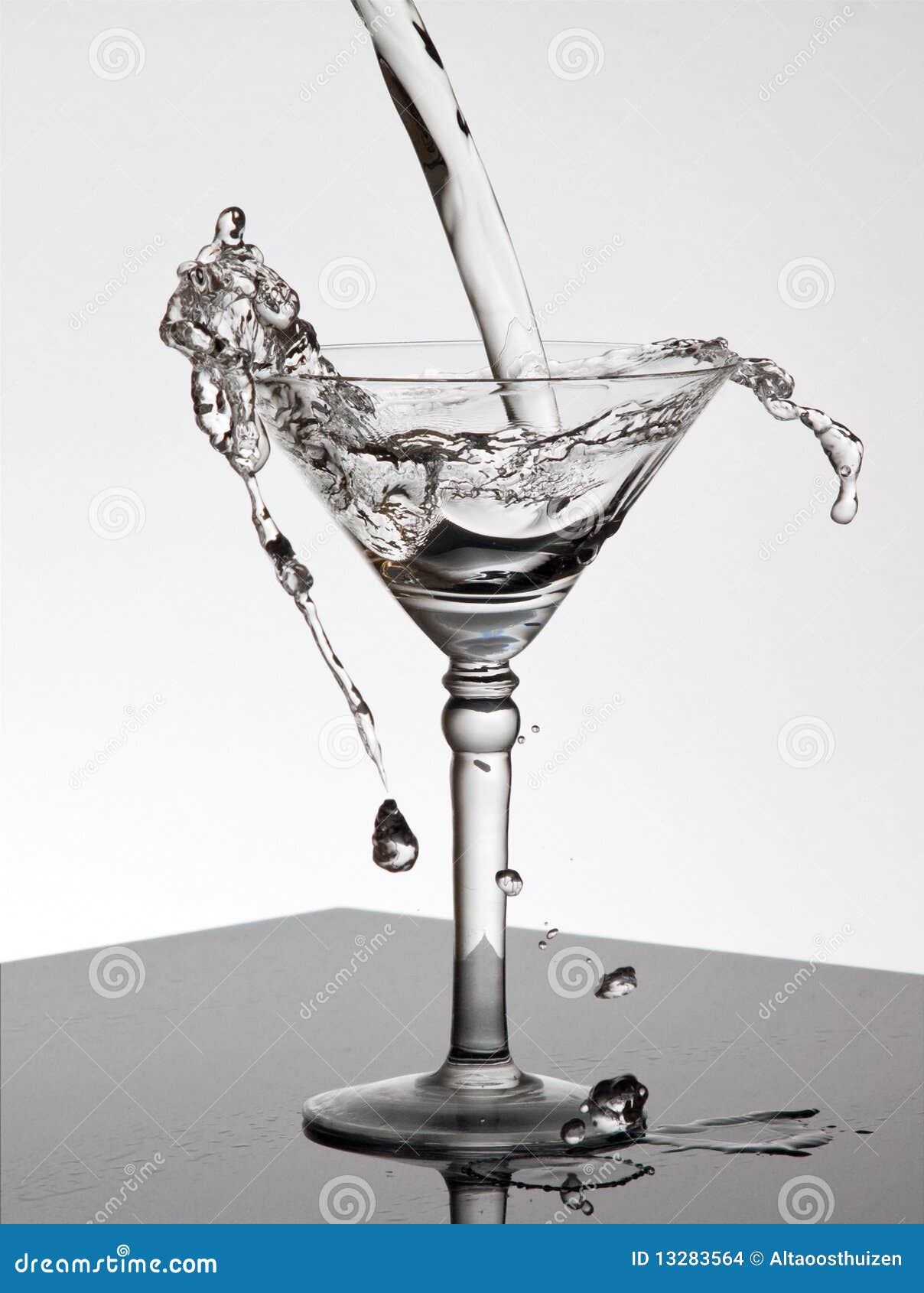 Water Pouring into a Martini Glass Stock Photo - Image of blend, pour ...