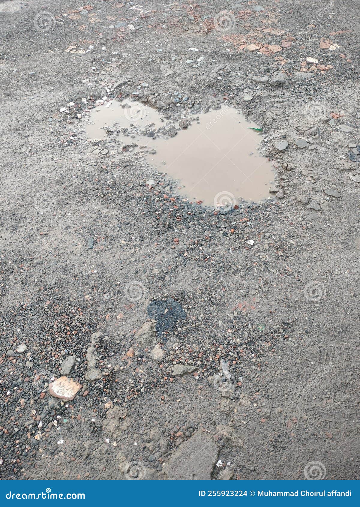Water Puddle in the Brown Ground Leftover Rain Stock Photo - Image of ...