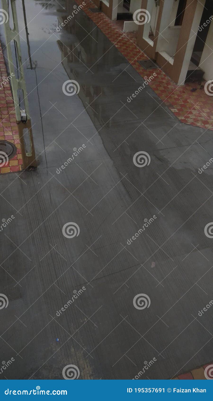 Water Puddles and Reflection of Row Houses during Monsoon Stock Image ...