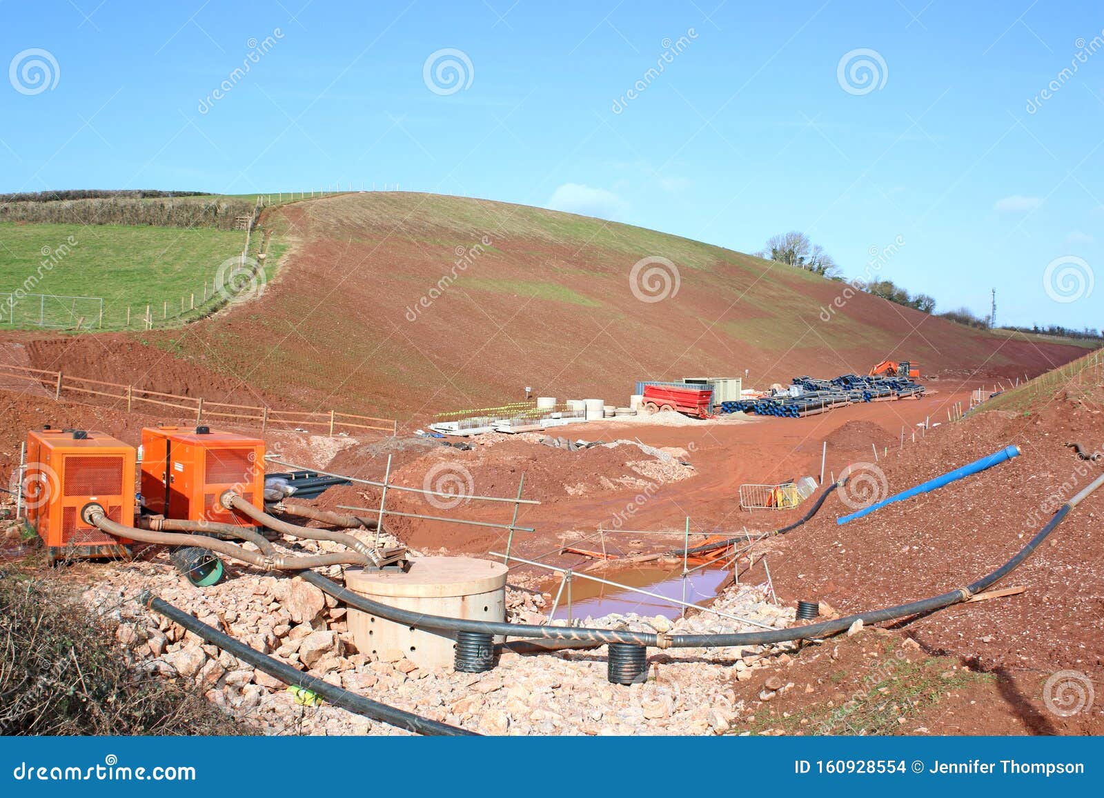 Water Pump on a Construction Site Stock Photo - Image of pipe, water ...