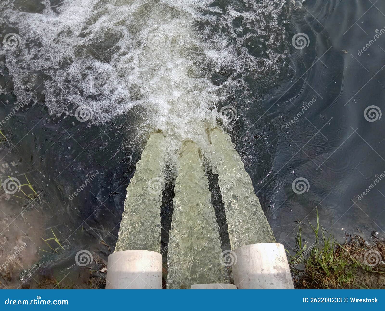 Water Pump with a Splash on the Pond for Hatchery Stock Image - Image ...