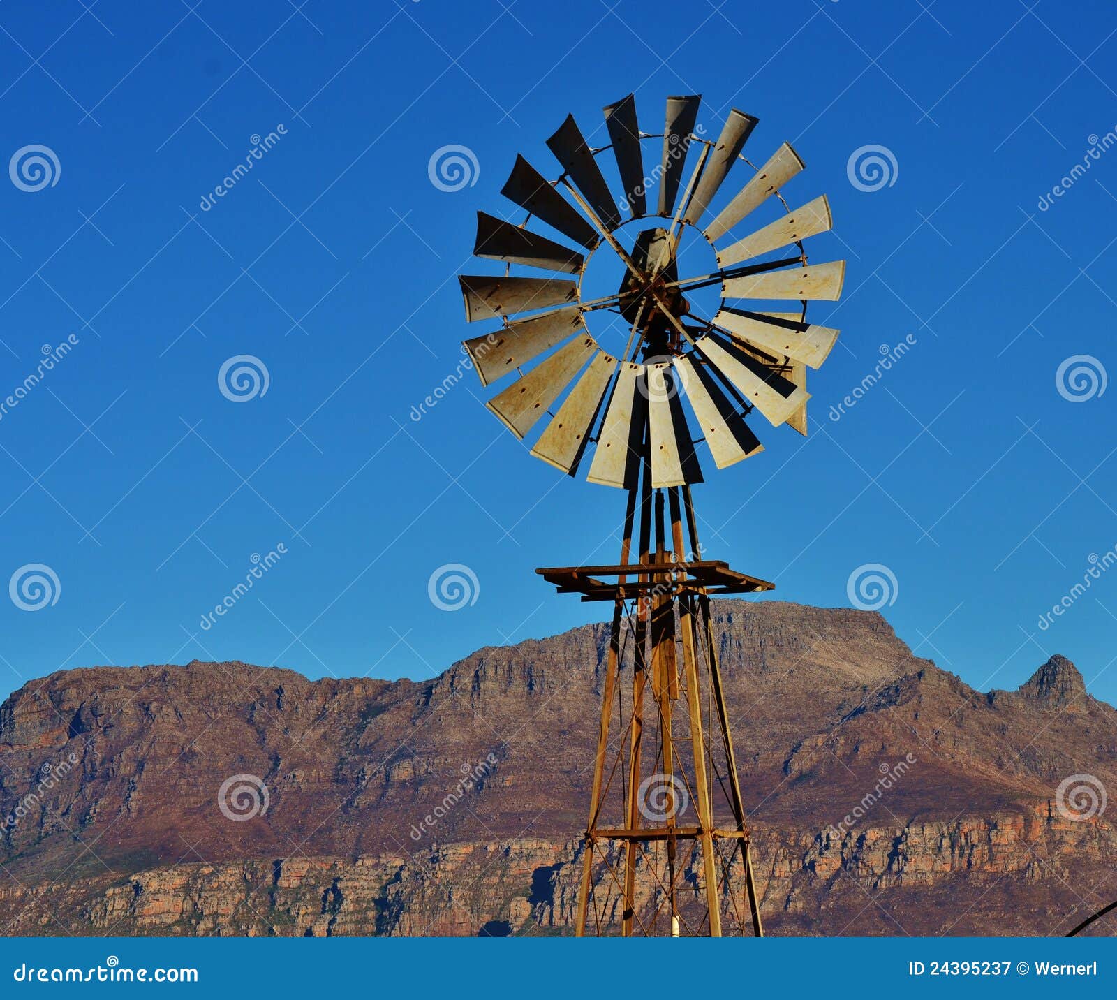 Water pump windmill stock image. Image of africa, wind - 24395237