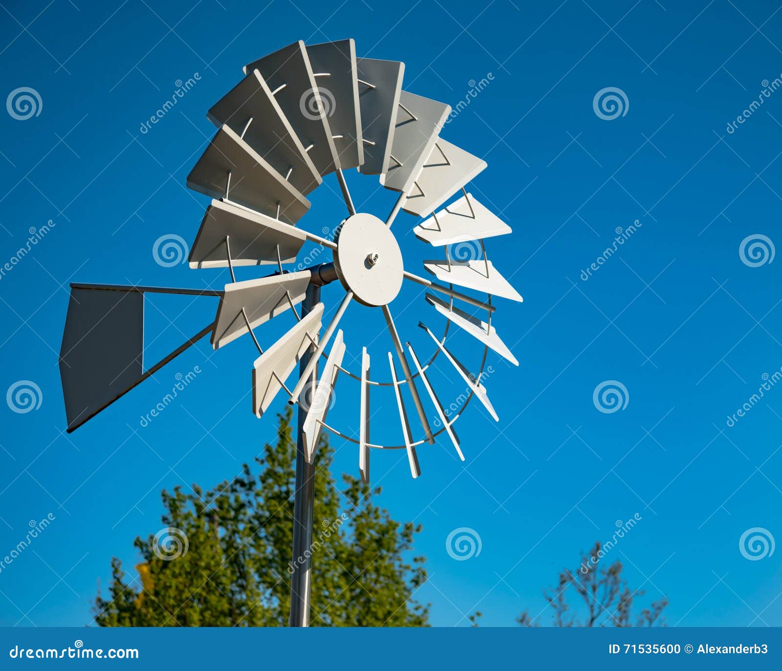 Water pumping windmill stock photo. Image of land, rotor - 71535600