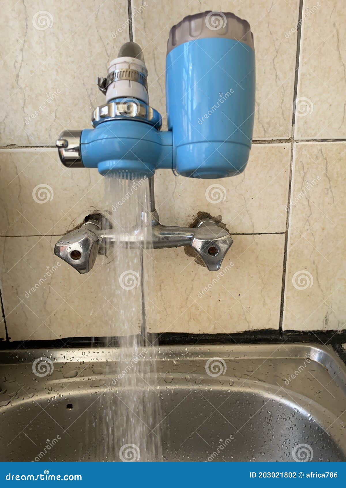 Water purifier on a tap stock photo. Image of kitchen - 203021802