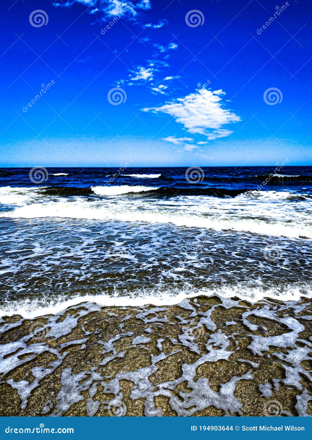 Water retreats from shore stock photo. Image of retreats - 194903644