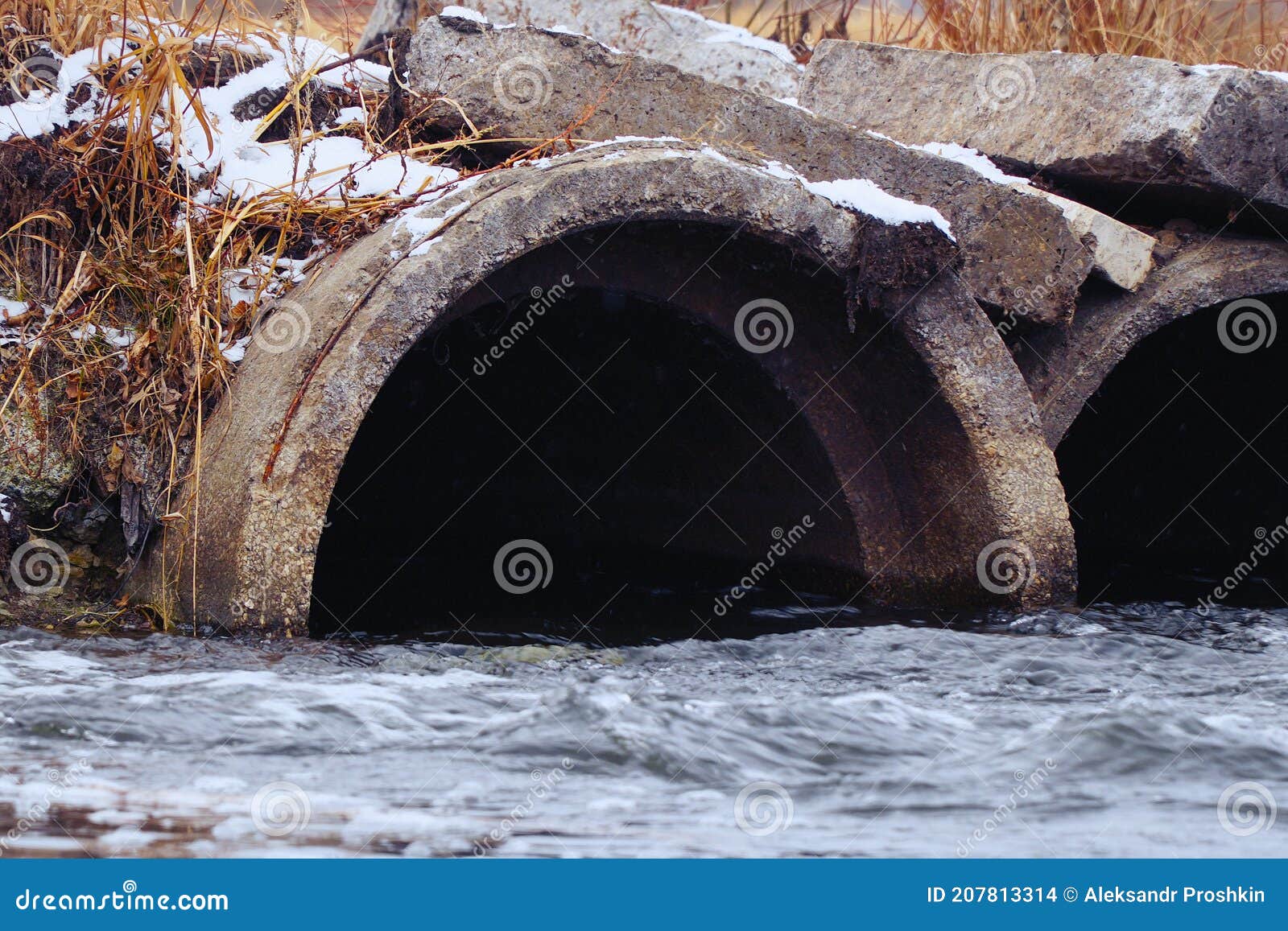 The Water on the River Flows from Large Pipes. Dam on River Stock Photo ...