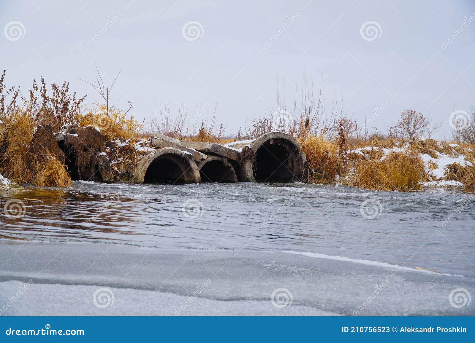 The Water on the River Flows from Large Pipes. Dam on River Stock Image ...