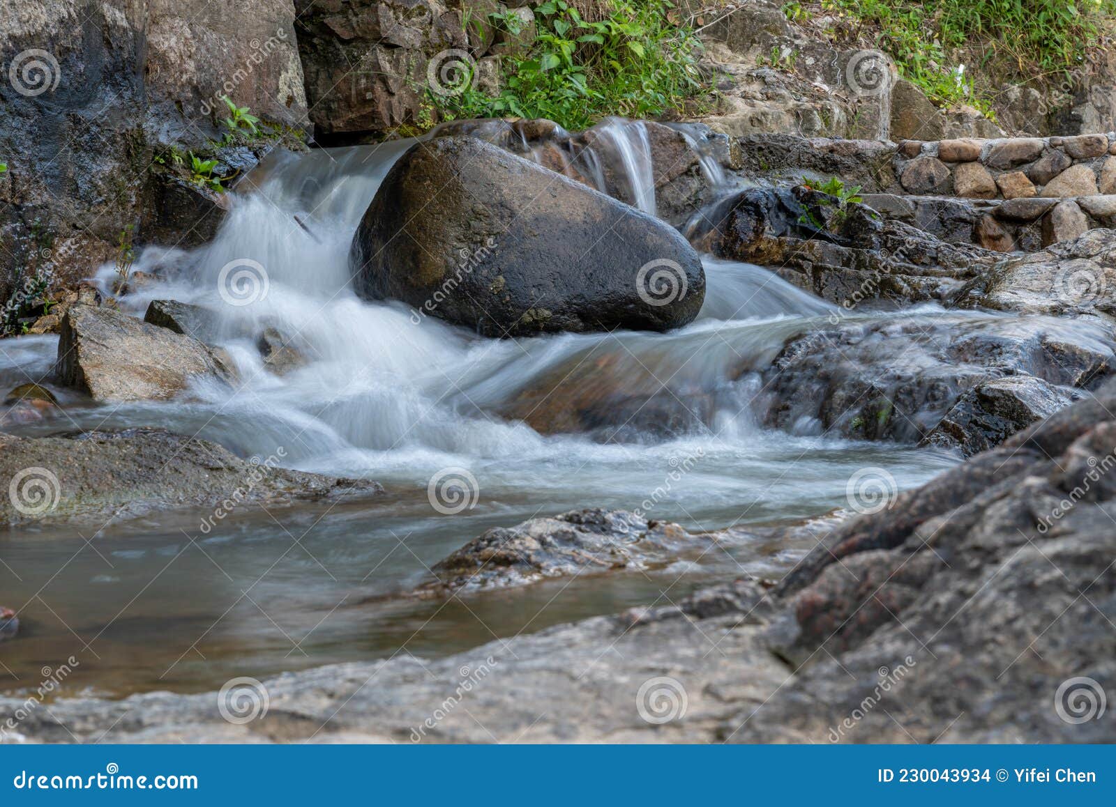 The Water in the River Forms a Small Waterfall Stock Photo - Image of ...