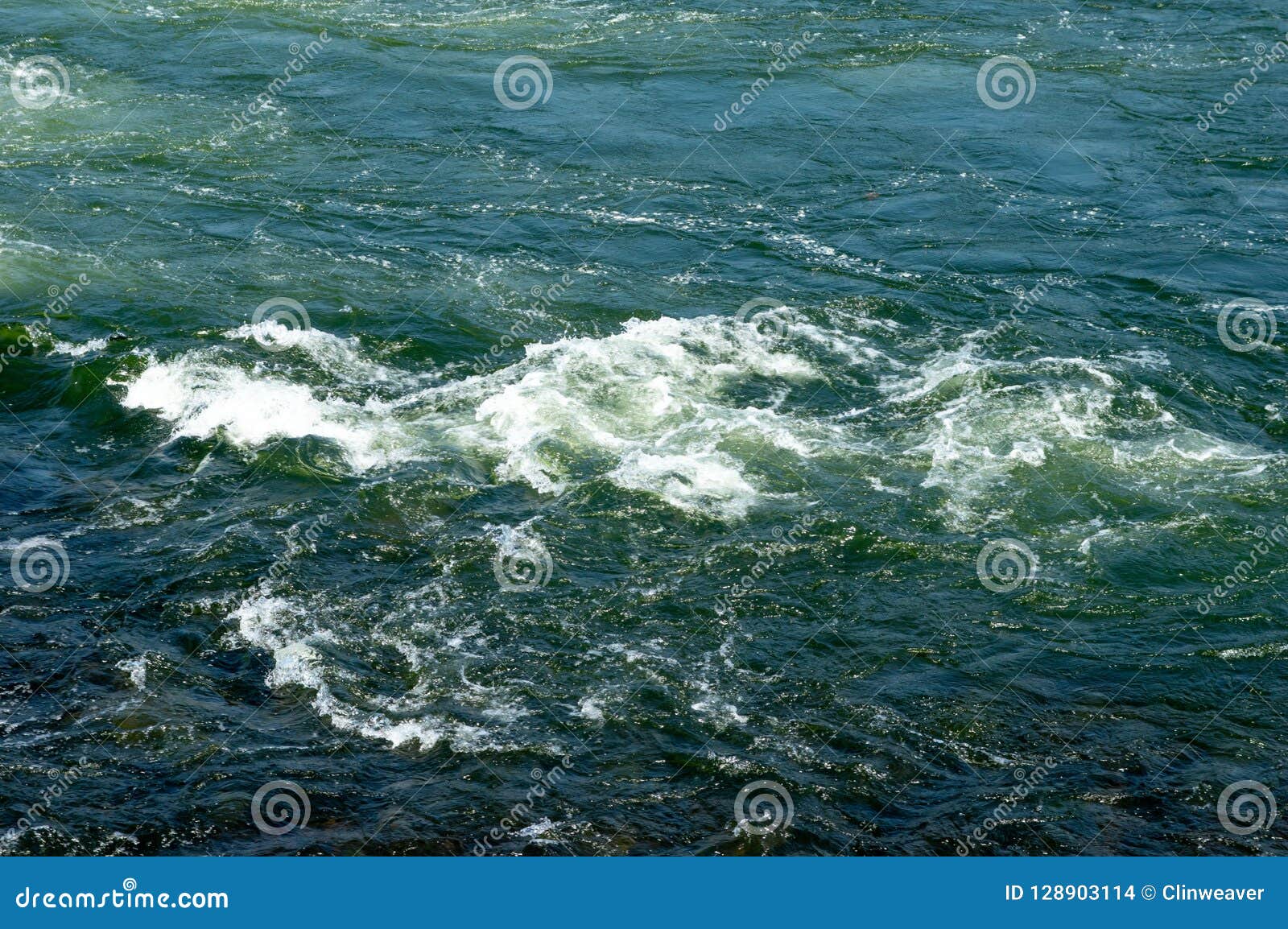 Water Running over Rocks stock photo. Image of water - 128903114