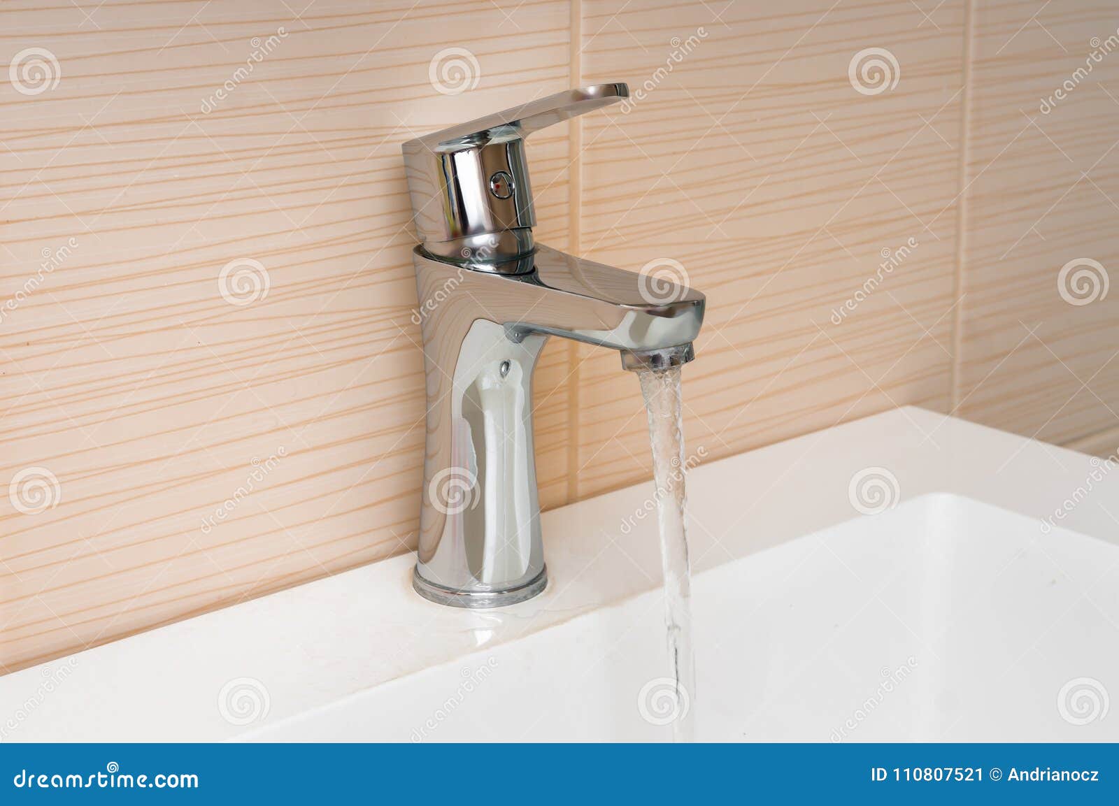 Water running from a tap stock image. Image of dripping - 110807521