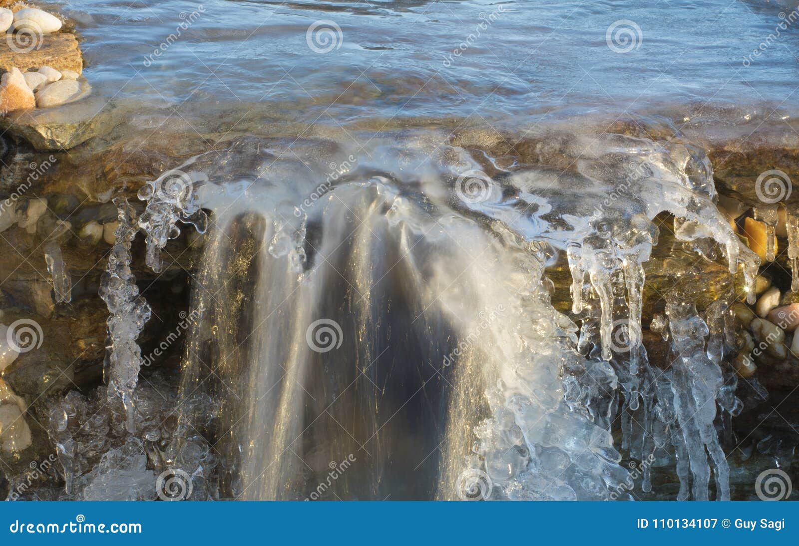Water Running Under the Ice Stock Image - Image of cold, icicle: 110134107