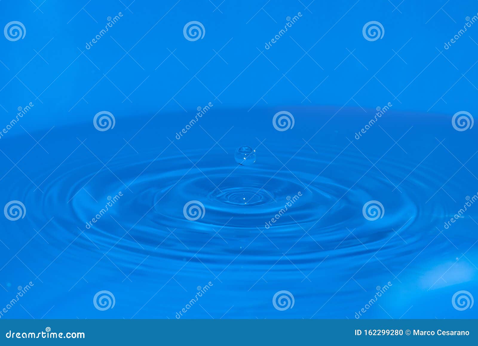 Water Sculpture with a Circular Drop Bounce on Top Stock Photo - Image ...