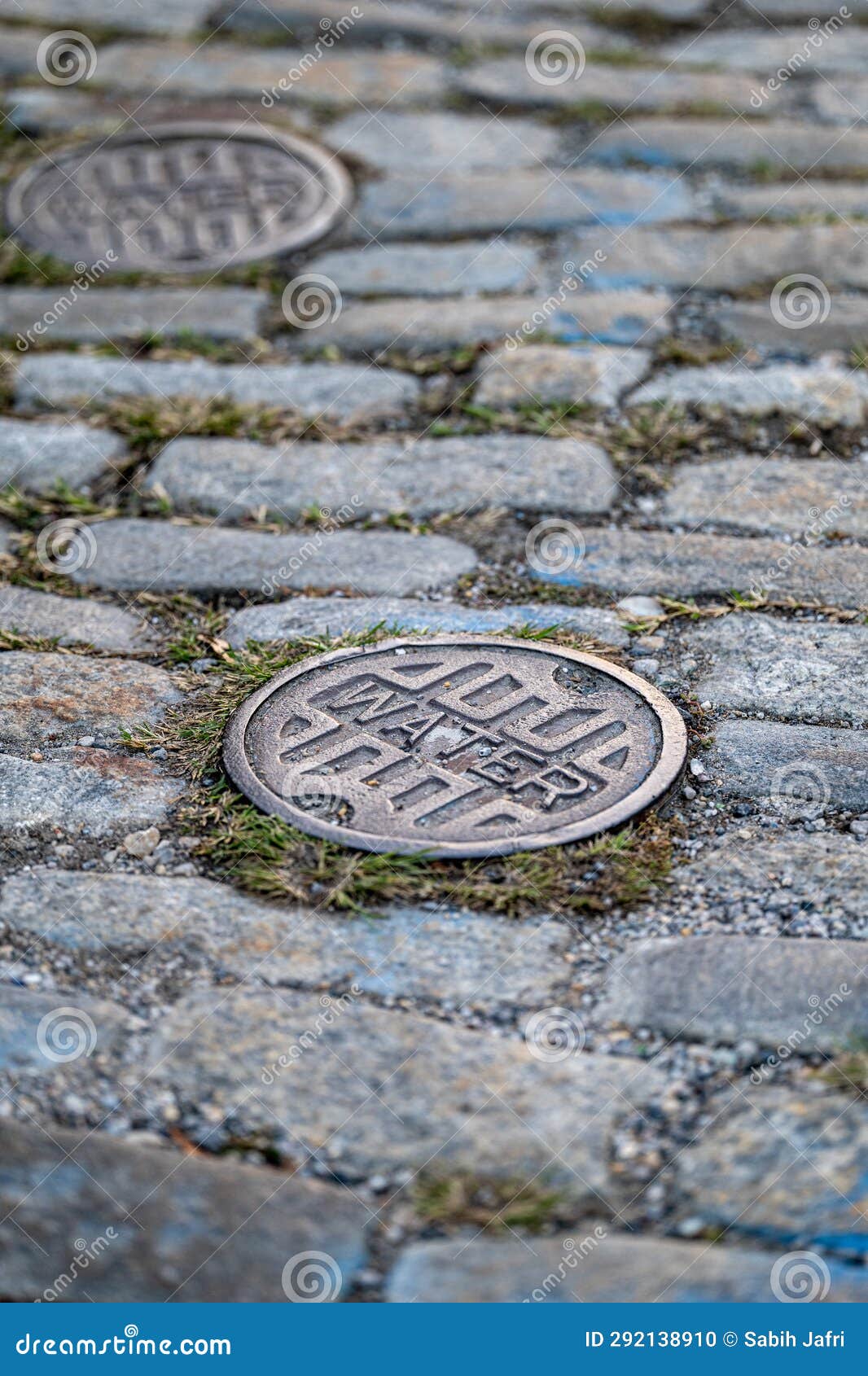 Drainage Of A Cobbled Road To The Side. Cobble Gutter Drained Into A ...