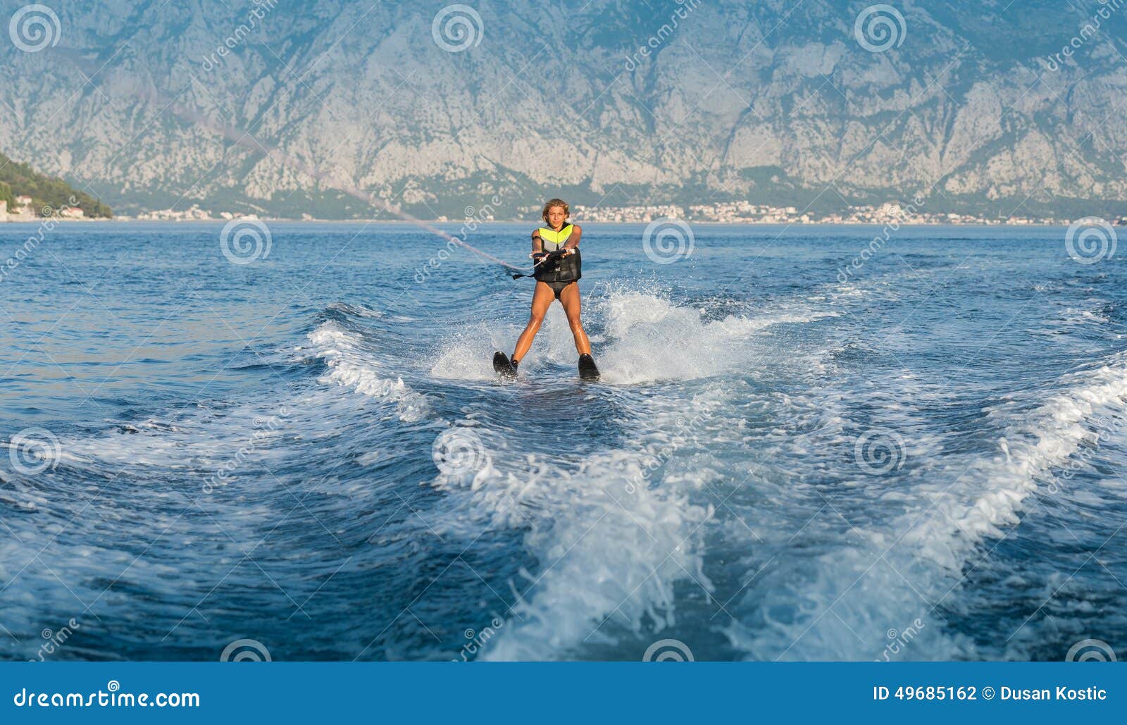 Water skiing on a sea stock photo. Image of speed, blue - 49685162