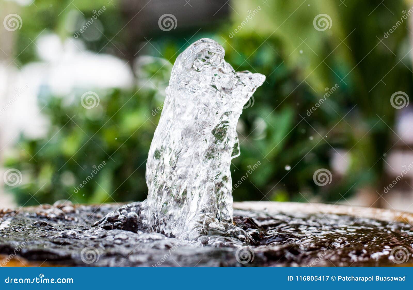Water in Small Fountain Flowing Up High from Pipe and Form Inter Stock ...