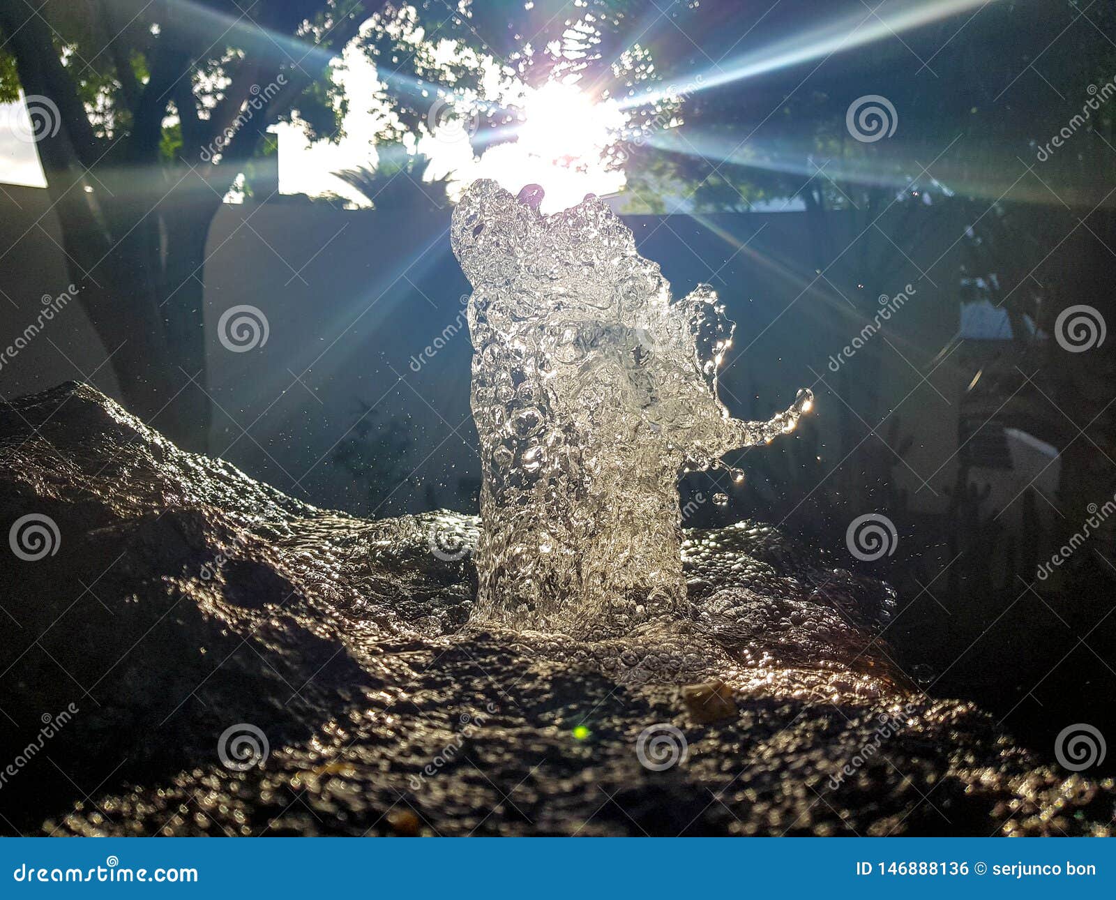 Water Source in the Foreground with Transparent Water Jet and ...