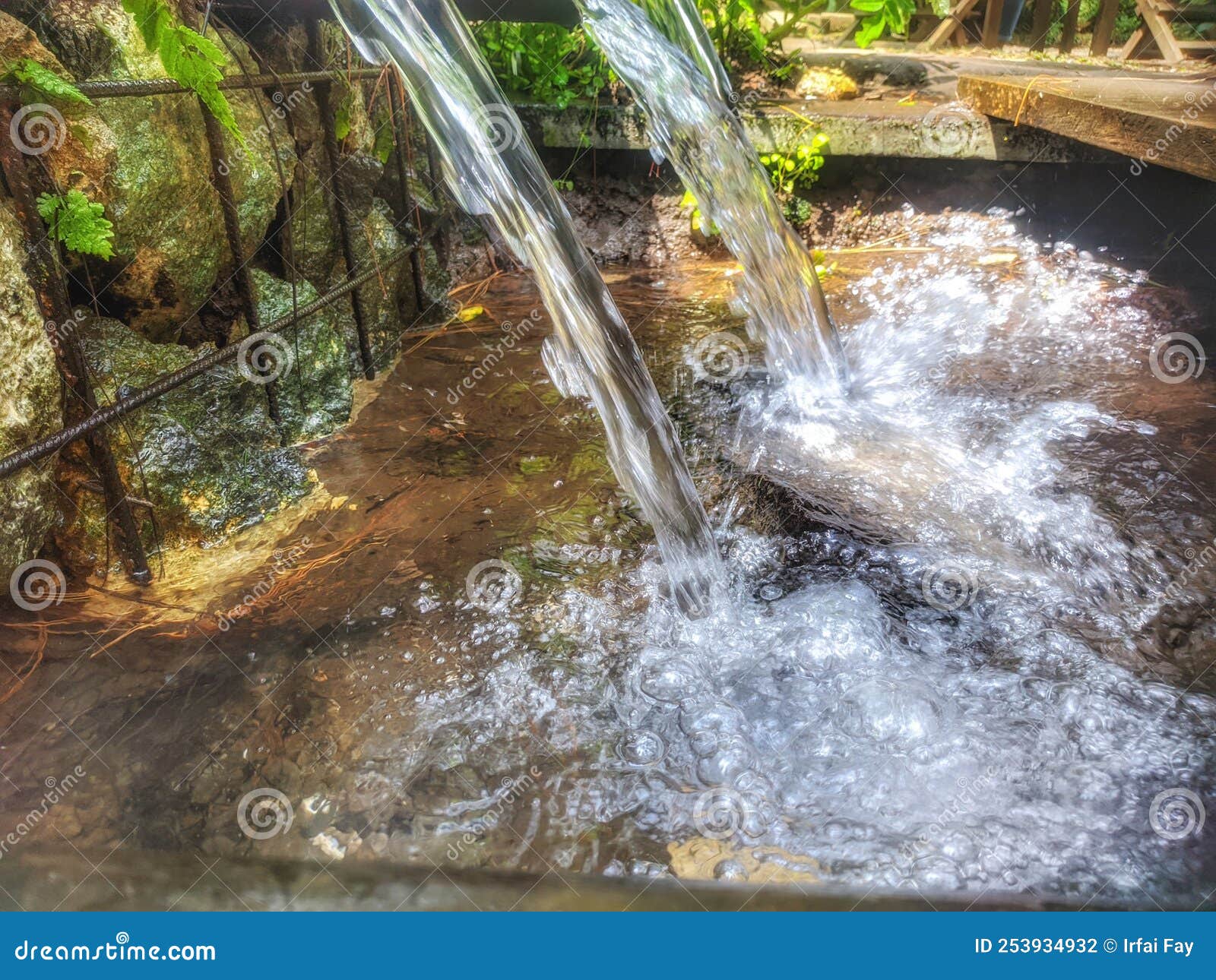 The Water Source from the Hill Flows through the Pipe Stock Photo ...