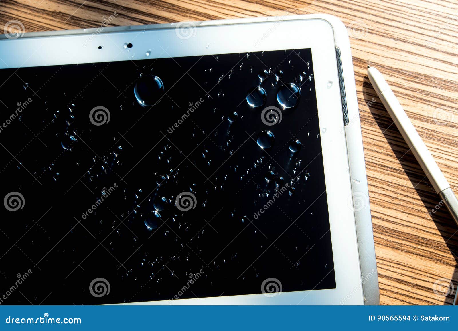 Water Spilled Onto the Tablet Stock Photo - Image of drop, water: 90565594