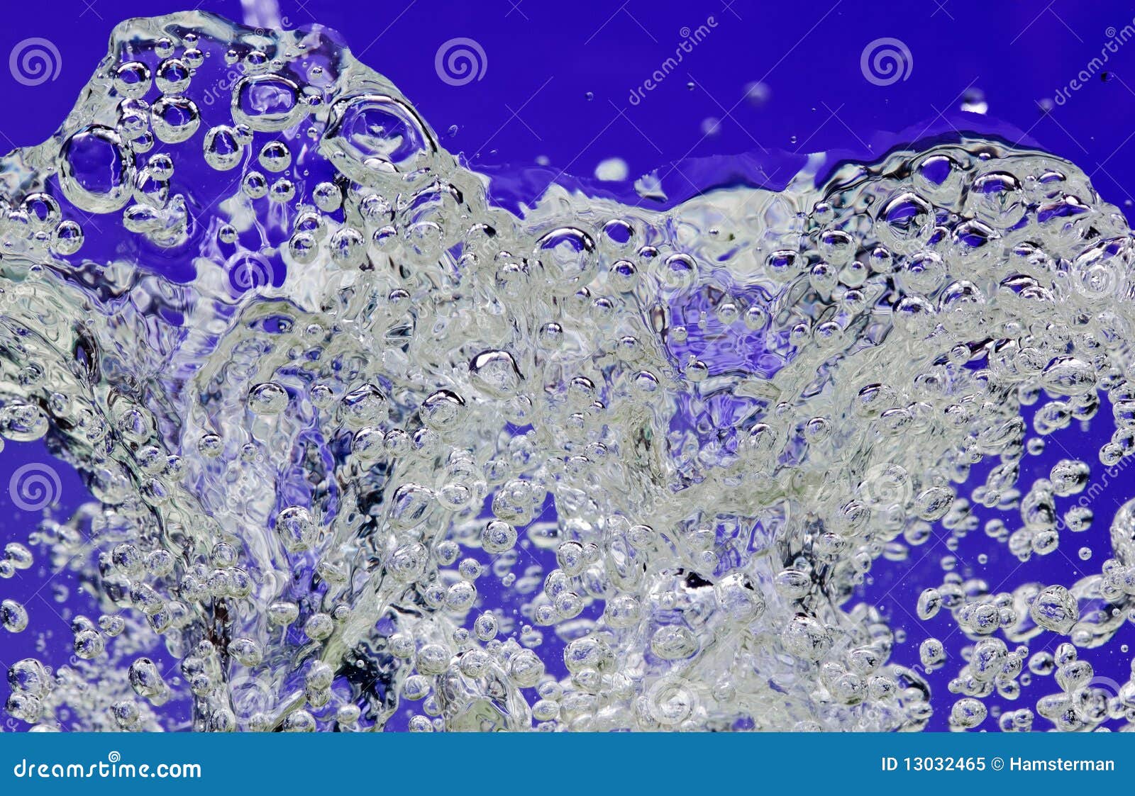 Water Splash with Air Bubbles on Blue Stock Image - Image of close ...