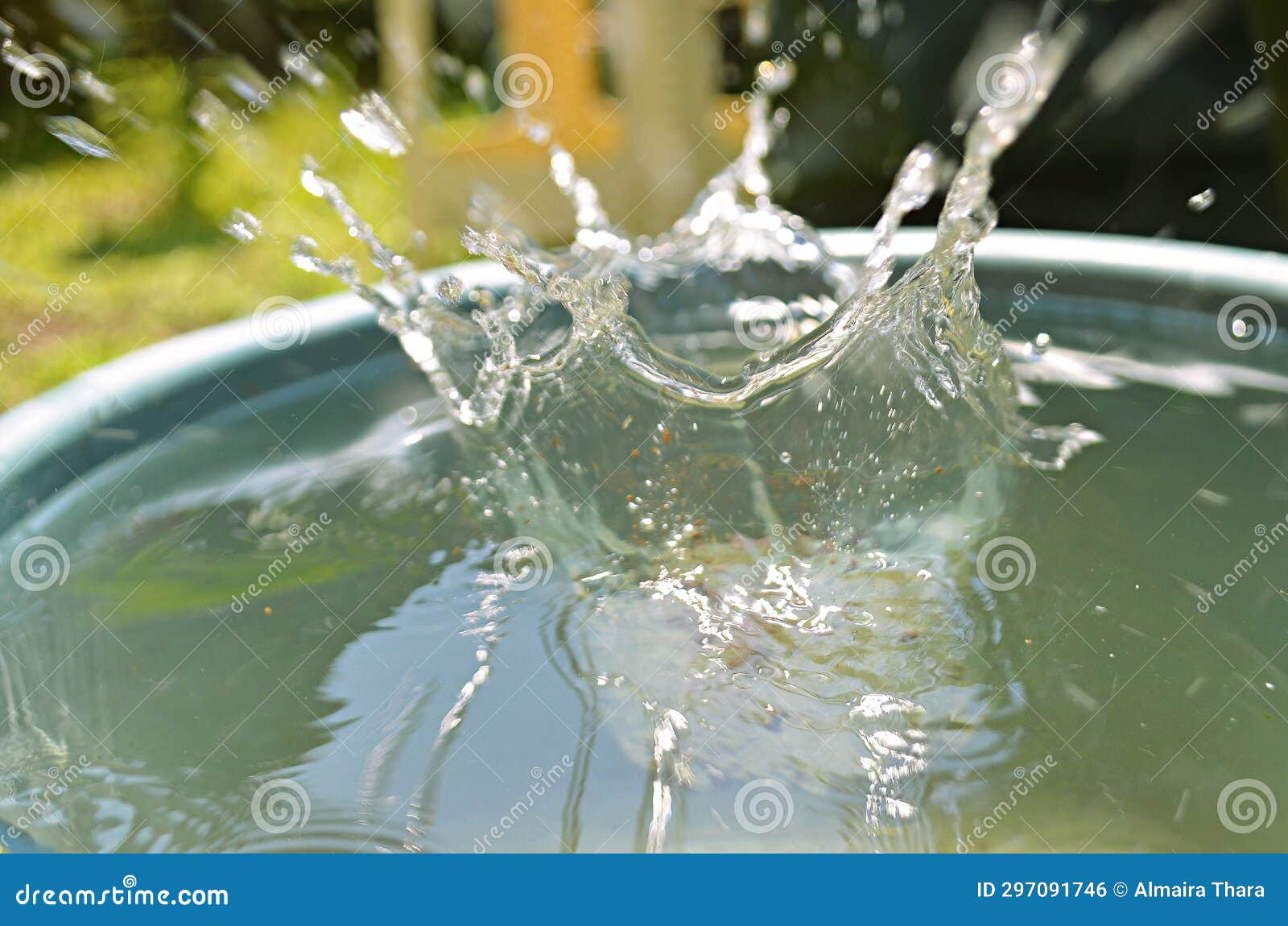 Water splash on a bucket stock photo. Image of winter - 297091746
