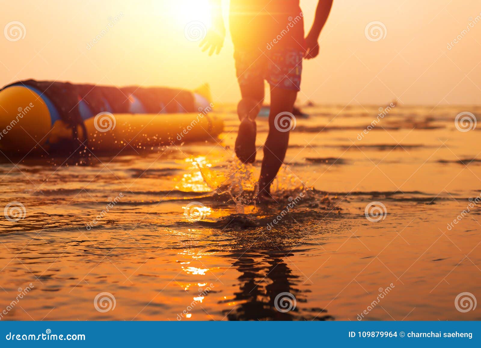 Sharp Front Water and Blur Child Running with Water Splash Stock Photo ...