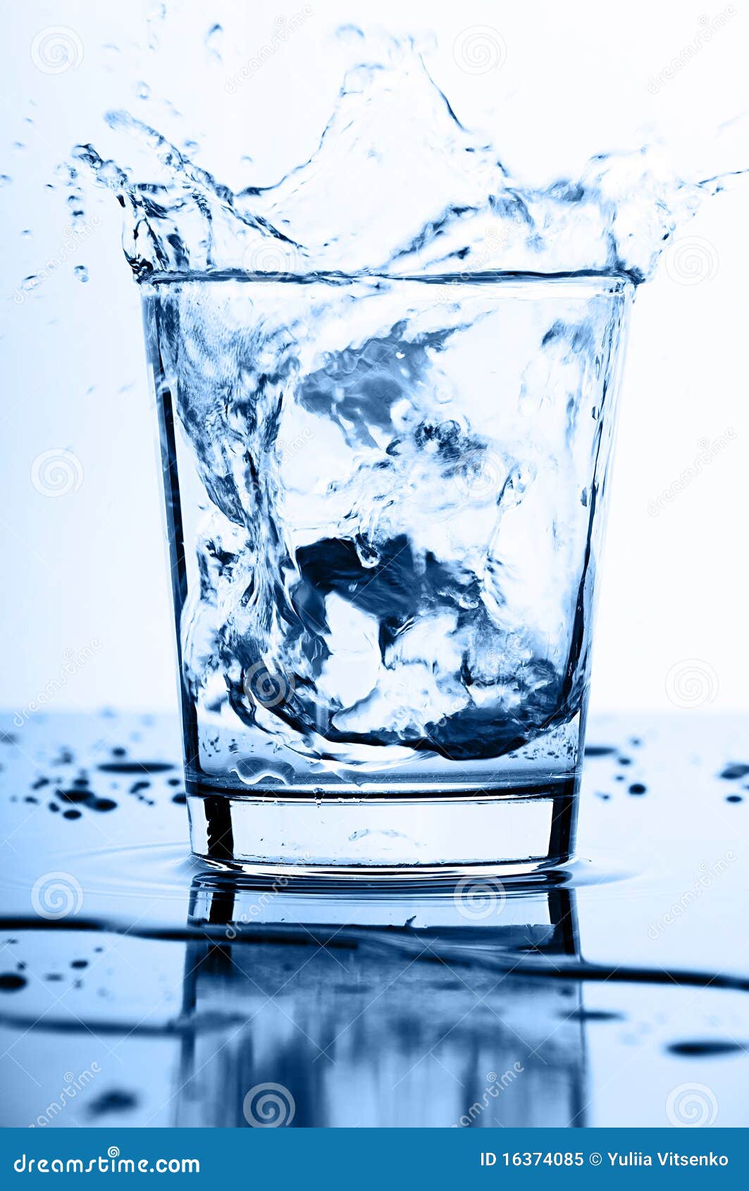 Water splash in glass stock image. Image of light, energy - 16374085