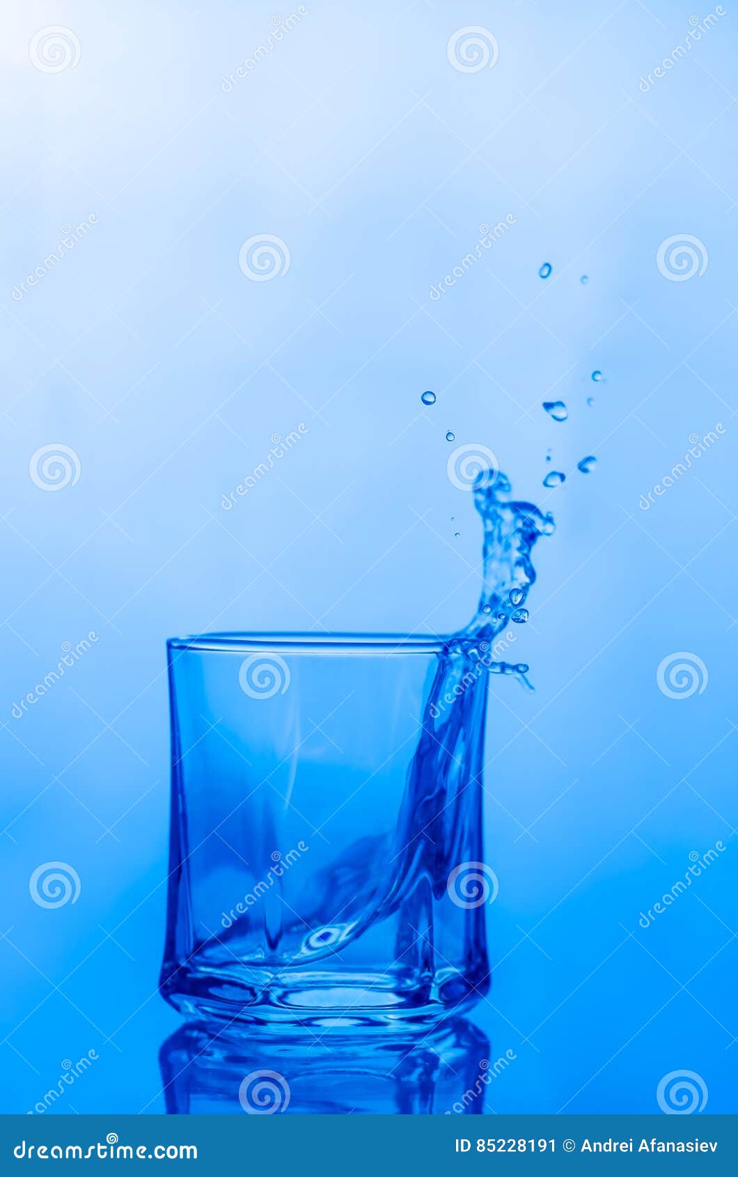 Water splash in a glass stock image. Image of clear, glass - 85228191