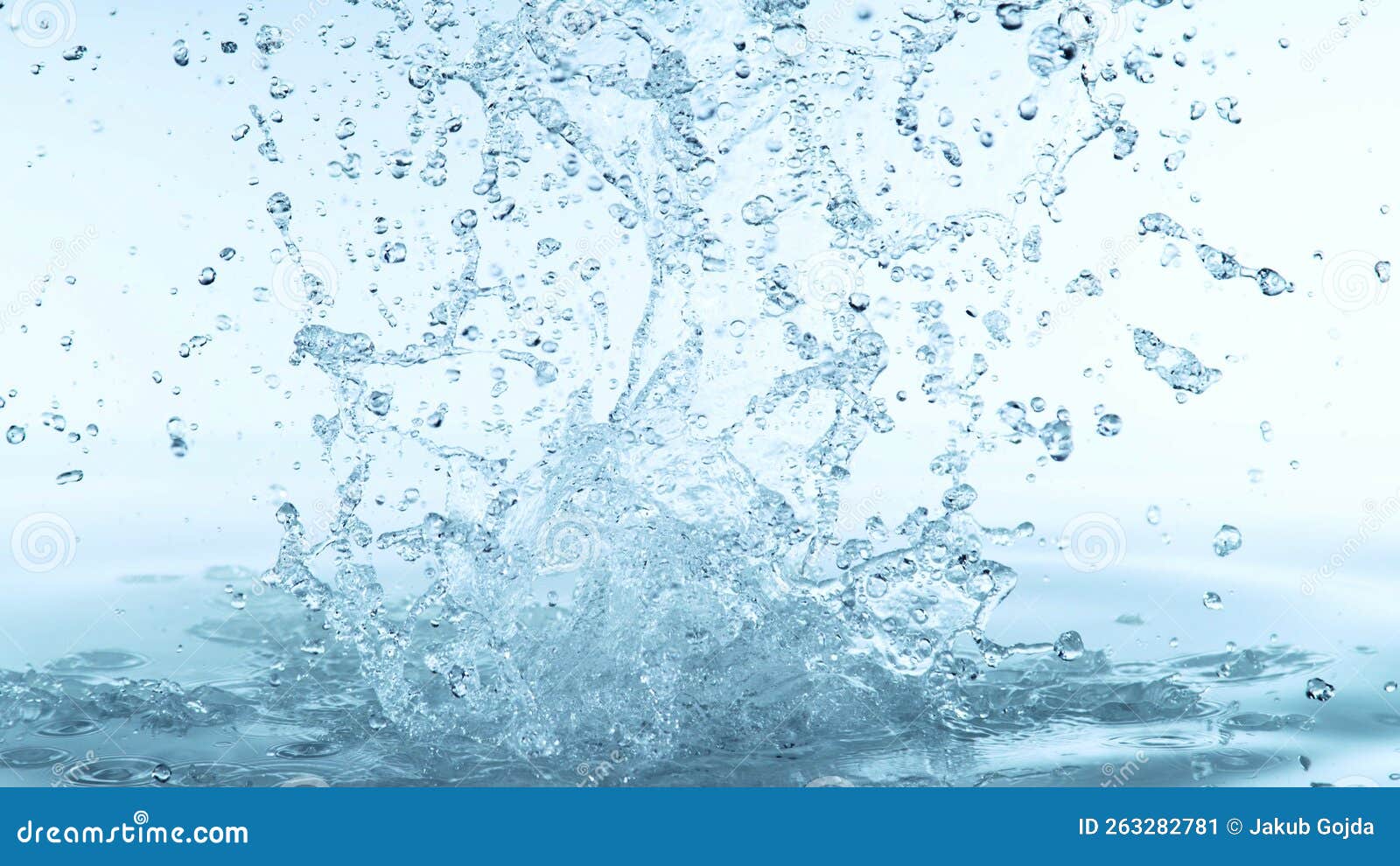 Water Splash Isolated on Soft Blue Background Stock Image - Image of ...