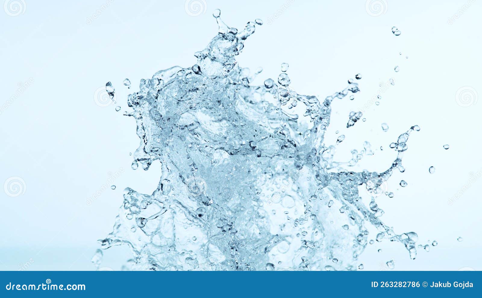 Water Splash Isolated on Soft Blue Background Stock Photo - Image of ...