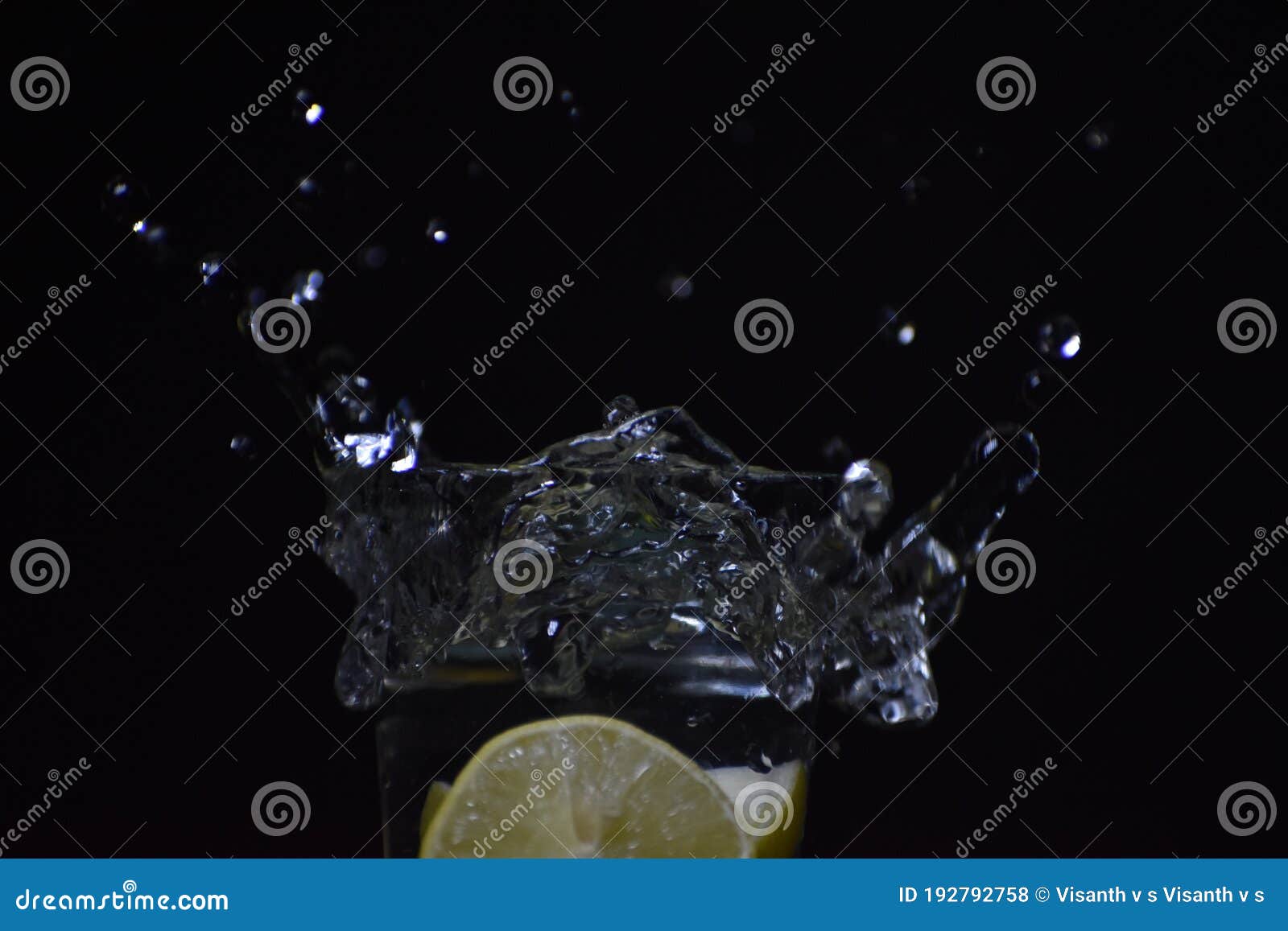 Water splash lemon closeup stock photo. Image of lighting - 192792758