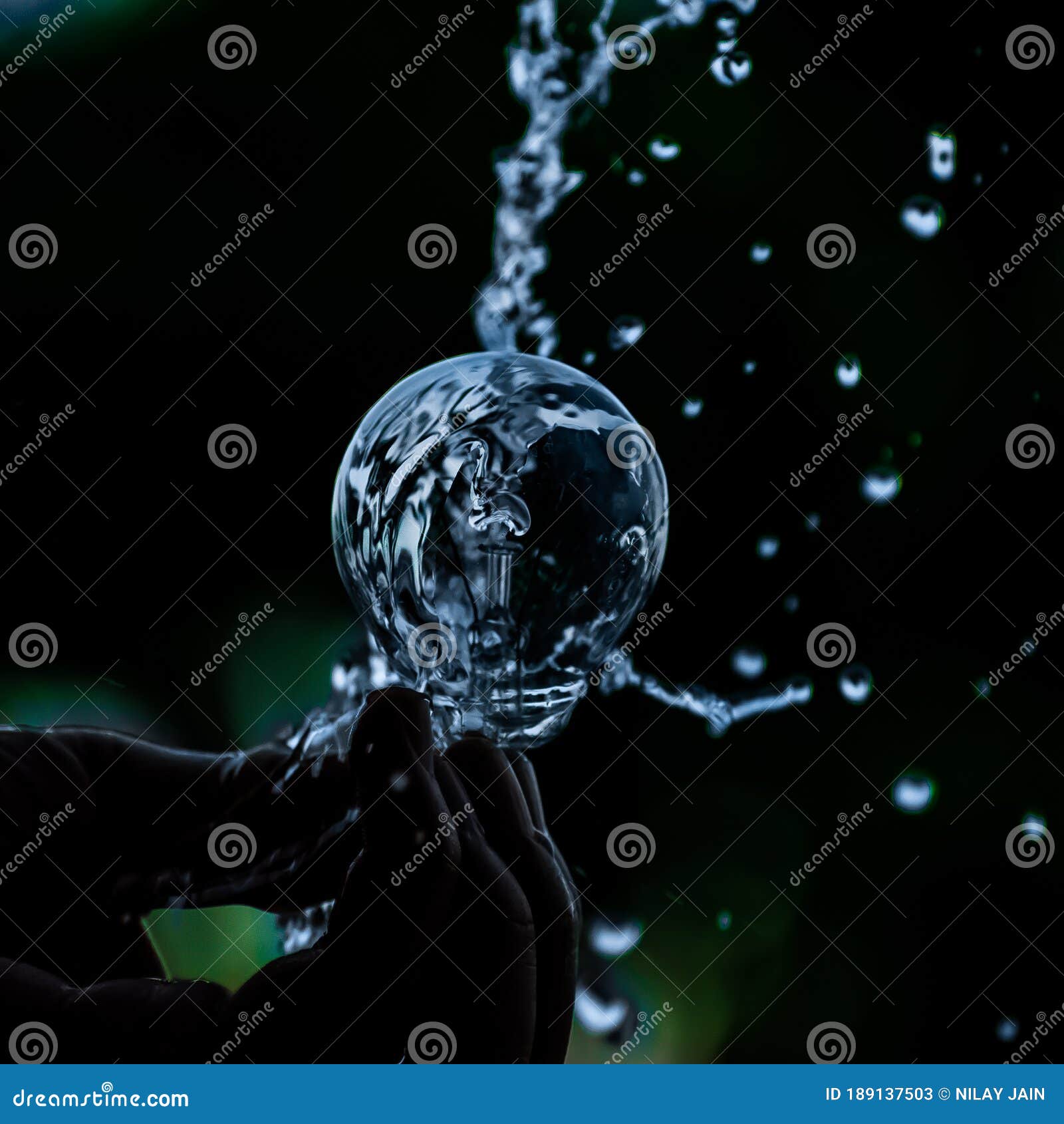 Water splash on light bulb stock image. Image of nikon - 189137503